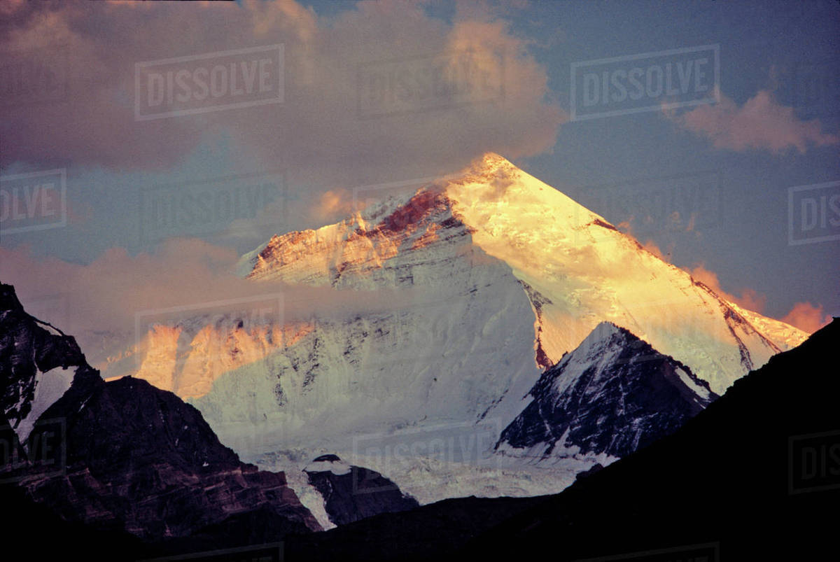 Asia, India, Ladakh, Nun-Kun Peak. Late light lies golden across the peaks of Nun-Kun Massif, in ...