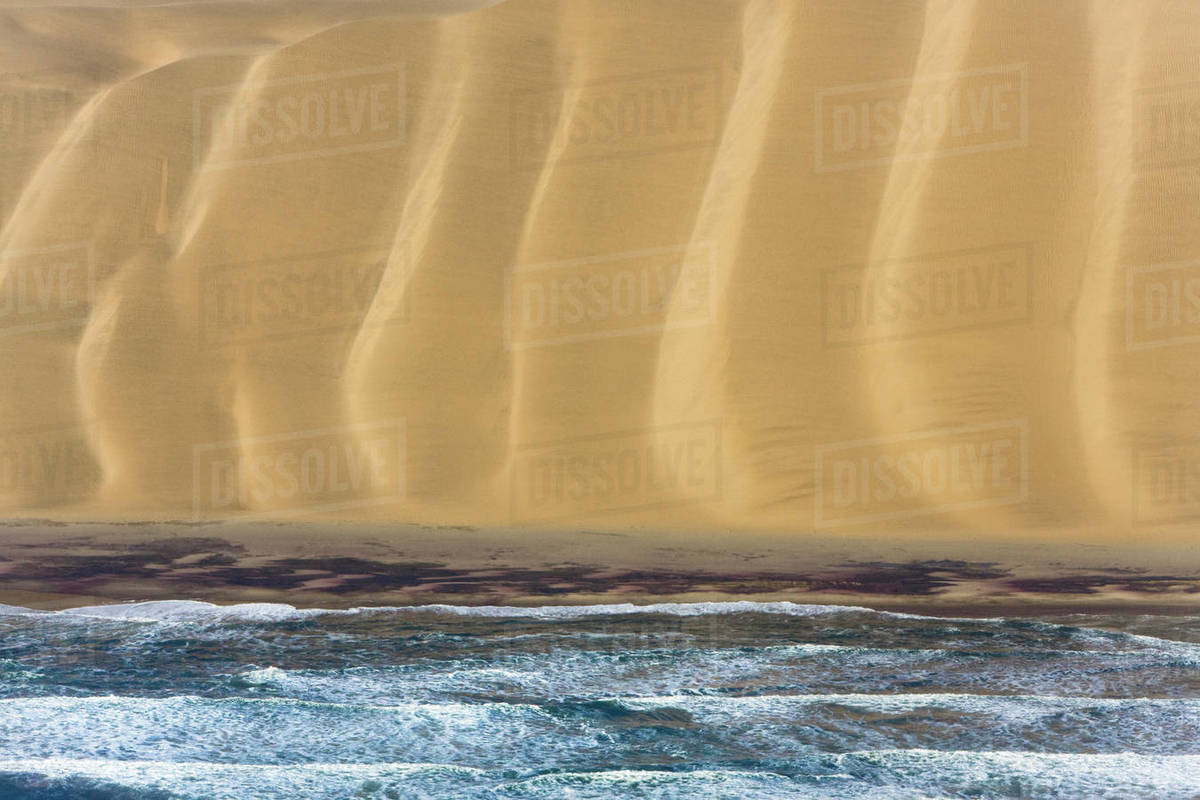 Namibia, Africa. Aerial view of Namibian Sand Dunes meeting the ...
