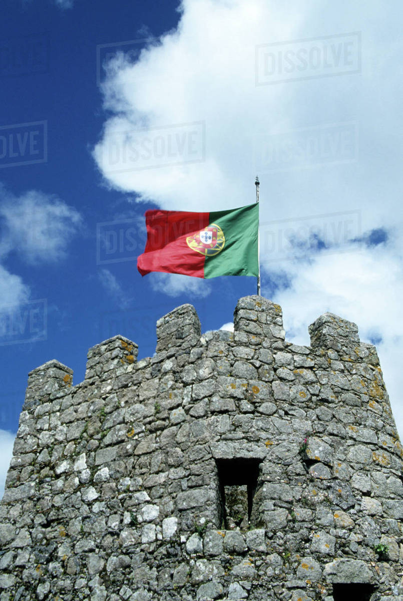 Portugal, Sintra. Portuguese flag on tower of Castelo dos Mouros ...