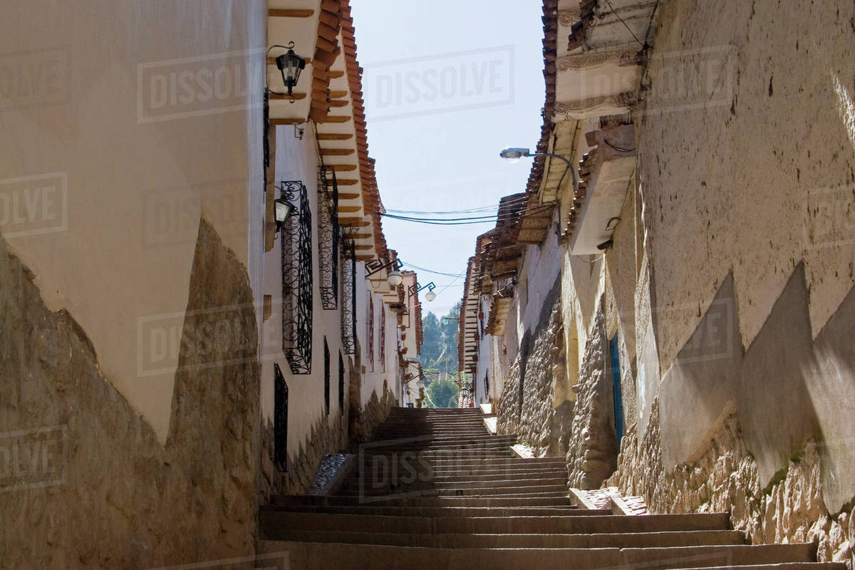 South America - Peru. Looking up stairs at old Inca wall foundations in ...