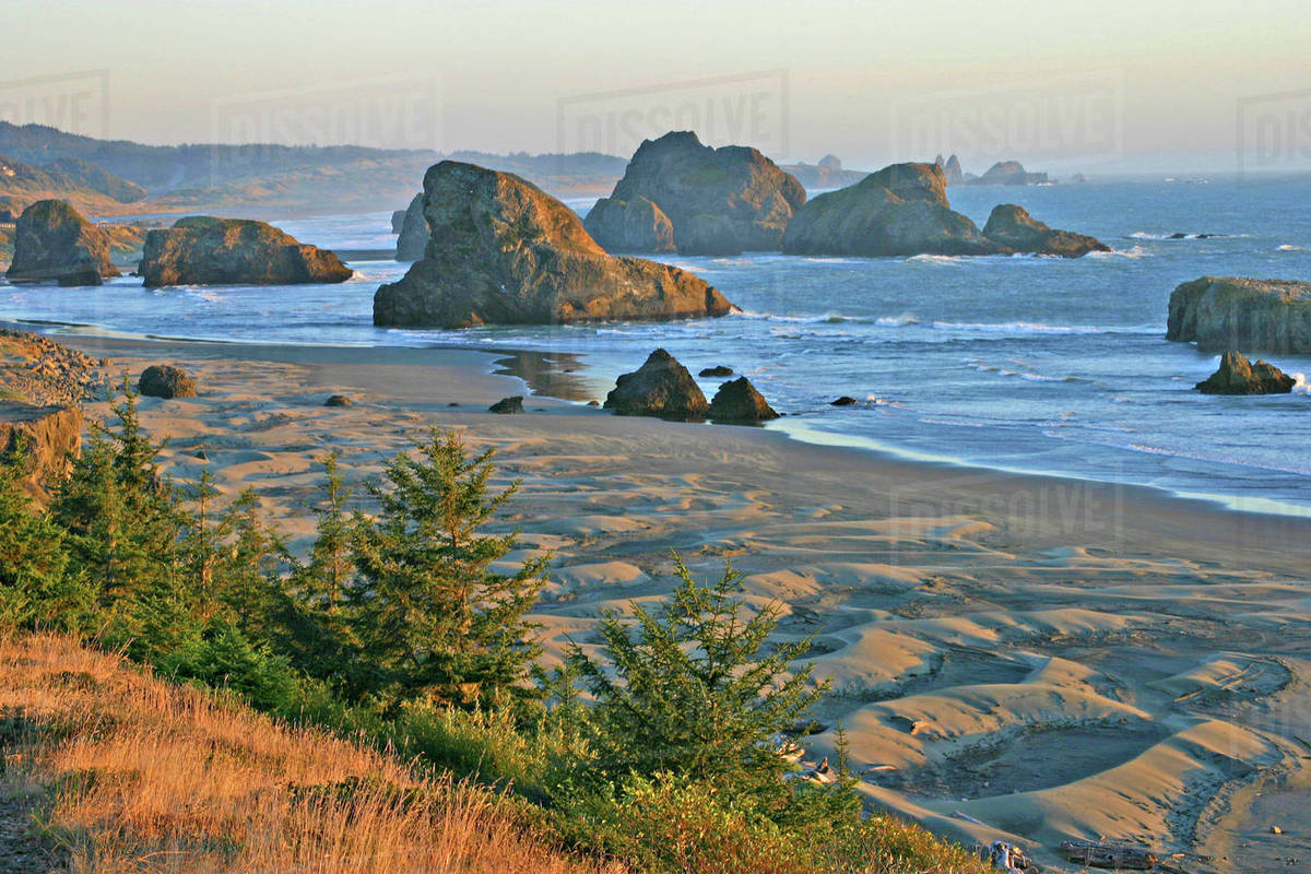 Rocky shoreline evening lighting near Gold Beach Oregon - Royalty-free ...