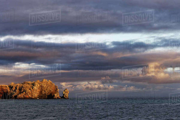 Sunset on rocky outcropping, Espanola Island, Galapagos Islands ...