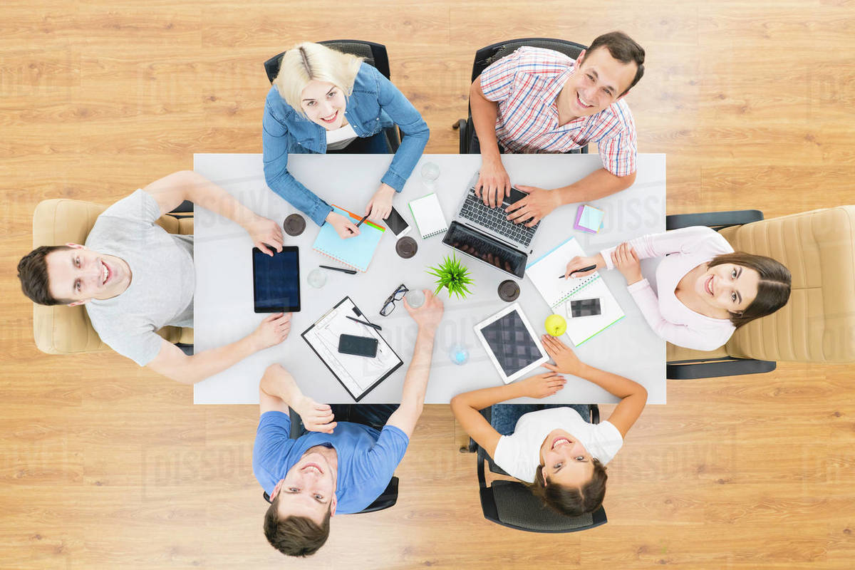 Six people working at the desktop - Royalty-free Stock Photo | Dissolve