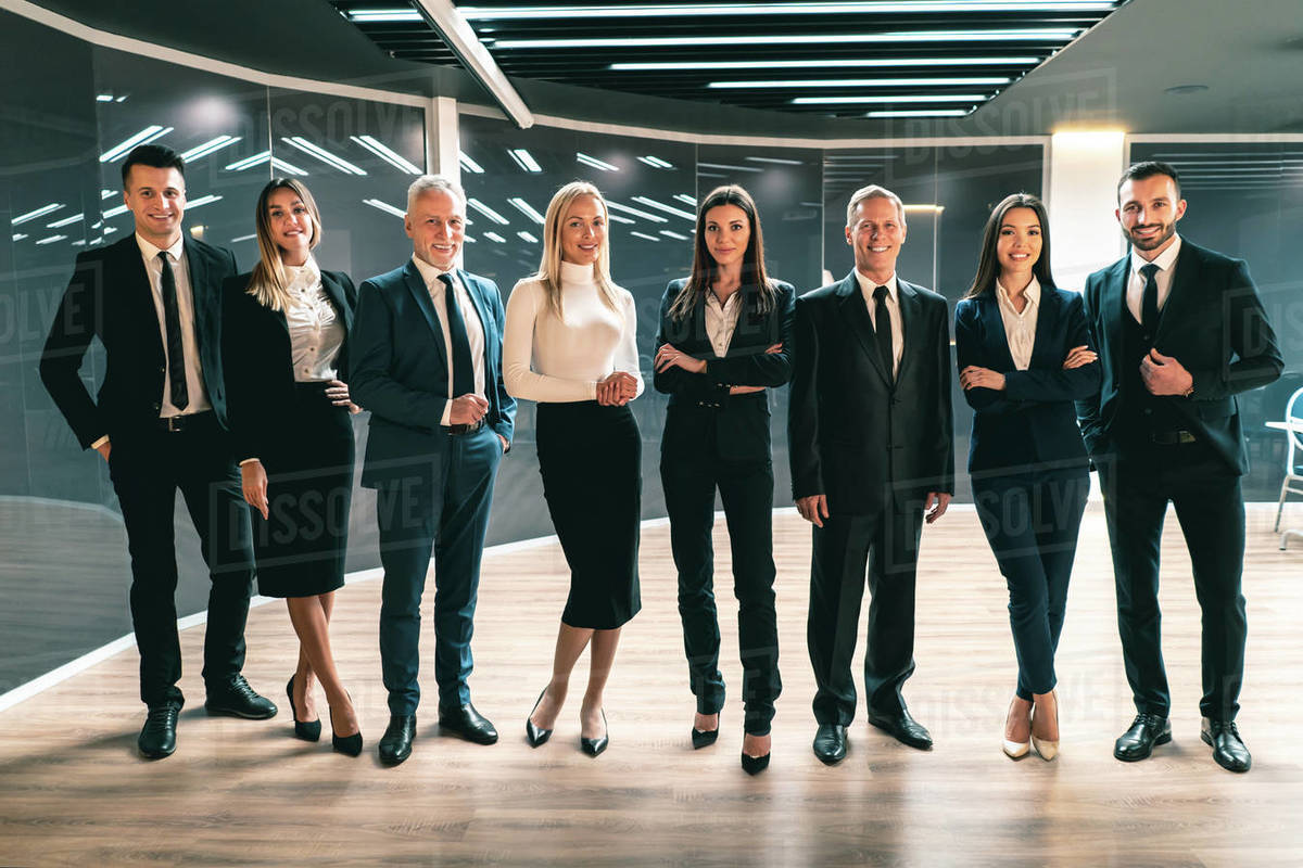 The business people standing indoor - Royalty-free Stock Photo | Dissolve