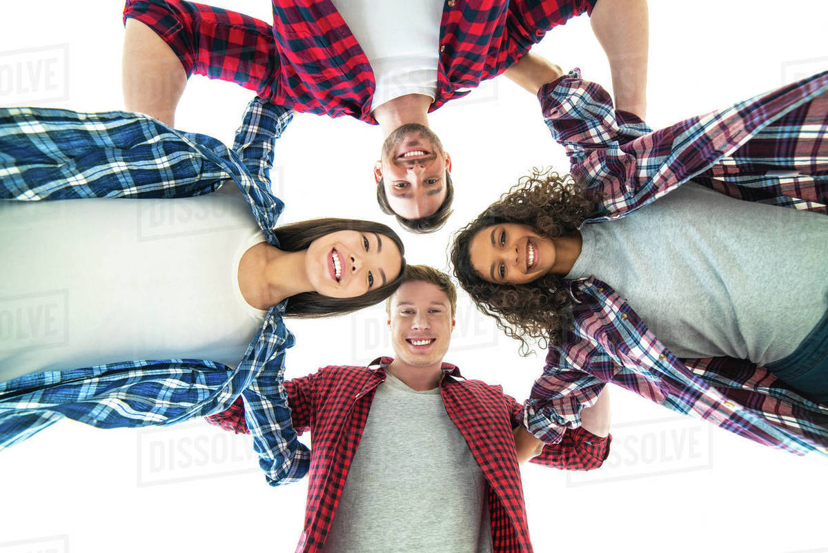 The four happy people looking to the camera - Royalty-free Stock Photo ...