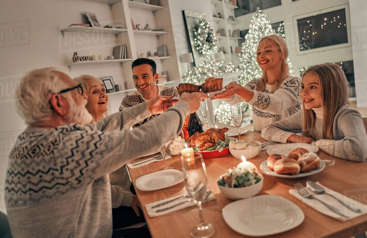 The happy family having a christmas dinner - Royalty-free Stock Photo ...