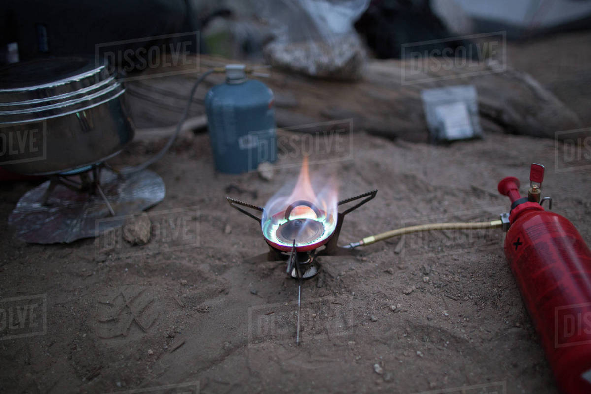 Lit camping stove - Stock Photo - Dissolve