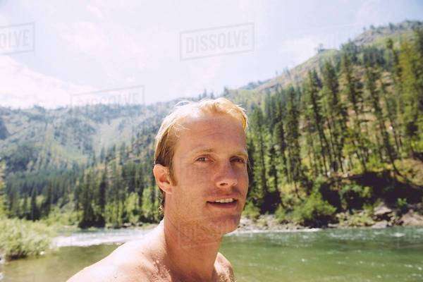 Portrait of mid adult man outdoors, close up - Royalty-free Stock Photo ...