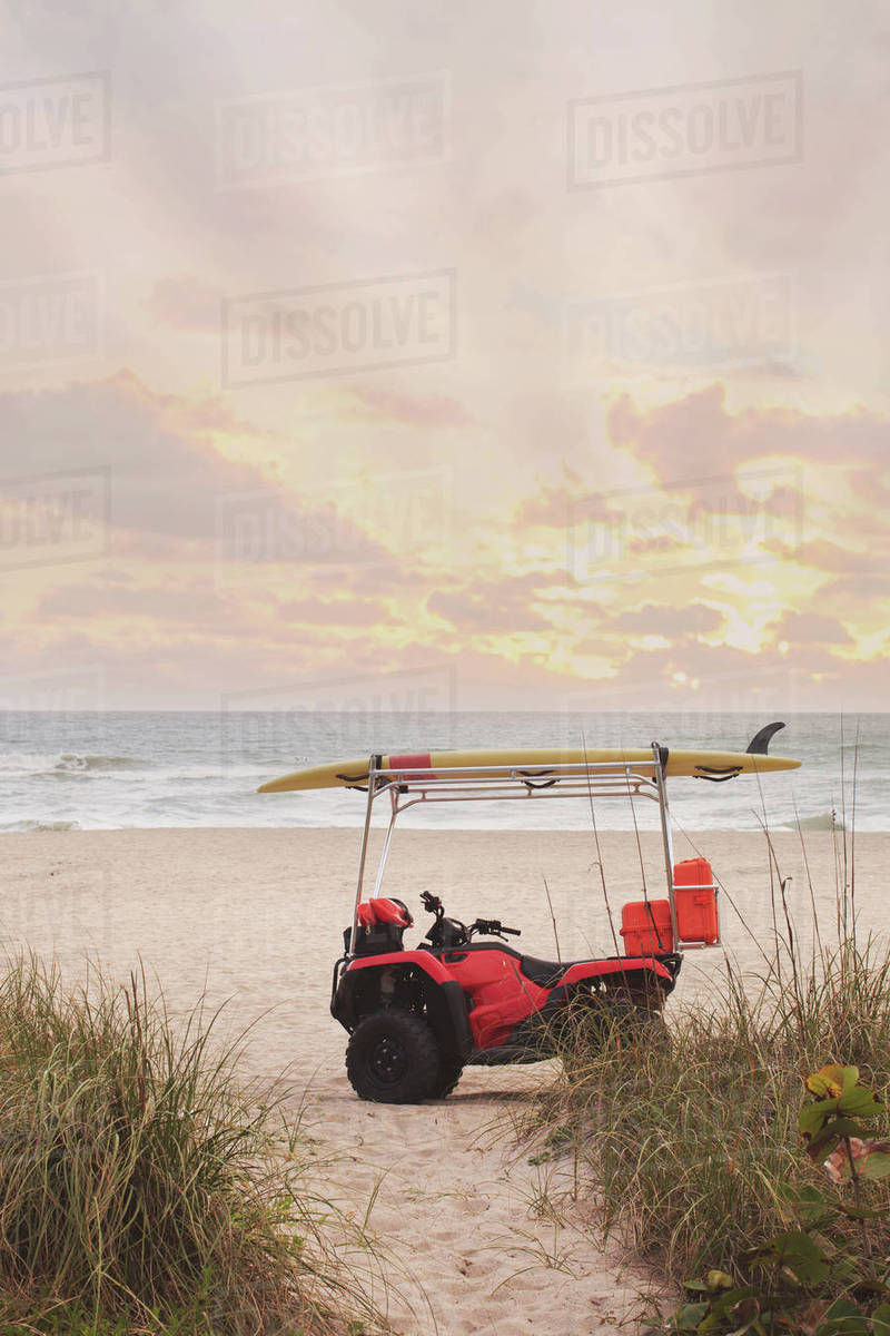 Lifeguard beach buggy on beach at sunset - Royalty-free Stock Photo ...