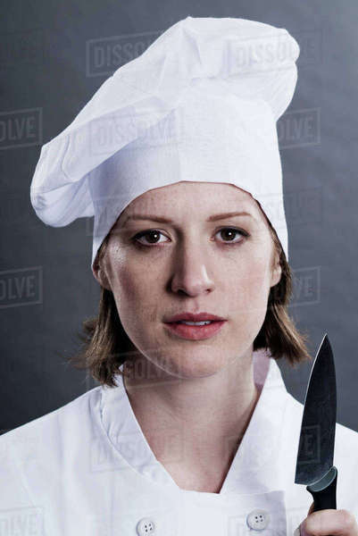 Close up of chefs serious face - Stock Photo - Dissolve