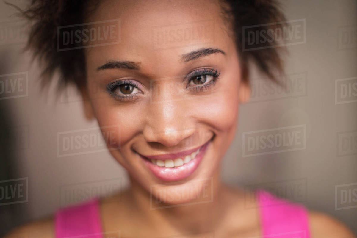 Close up of woman's smiling face - Royalty-free Stock Photo | Dissolve