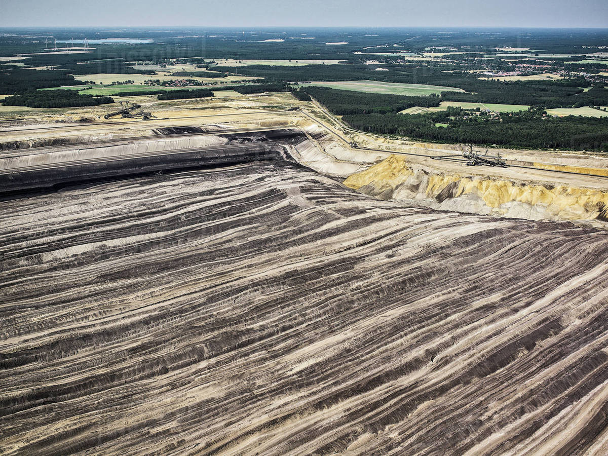 Aerial view of strip coal mining field - Stock Photo - Dissolve
