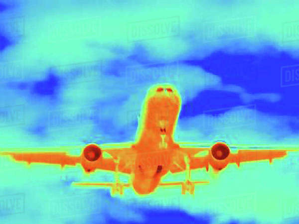 Thermal image of airplane in sky - Royalty-free Stock Photo | Dissolve