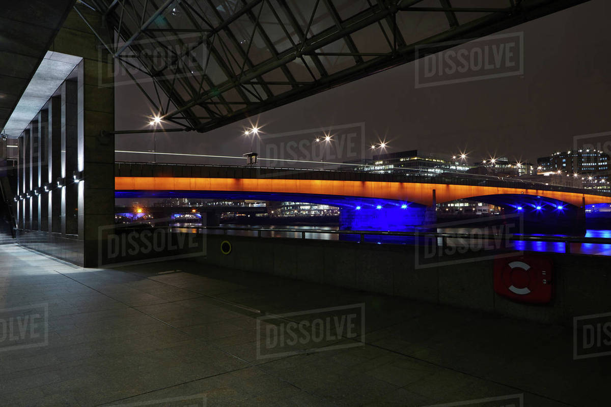 Urban bridge lit up at night - Royalty-free Stock Photo | Dissolve