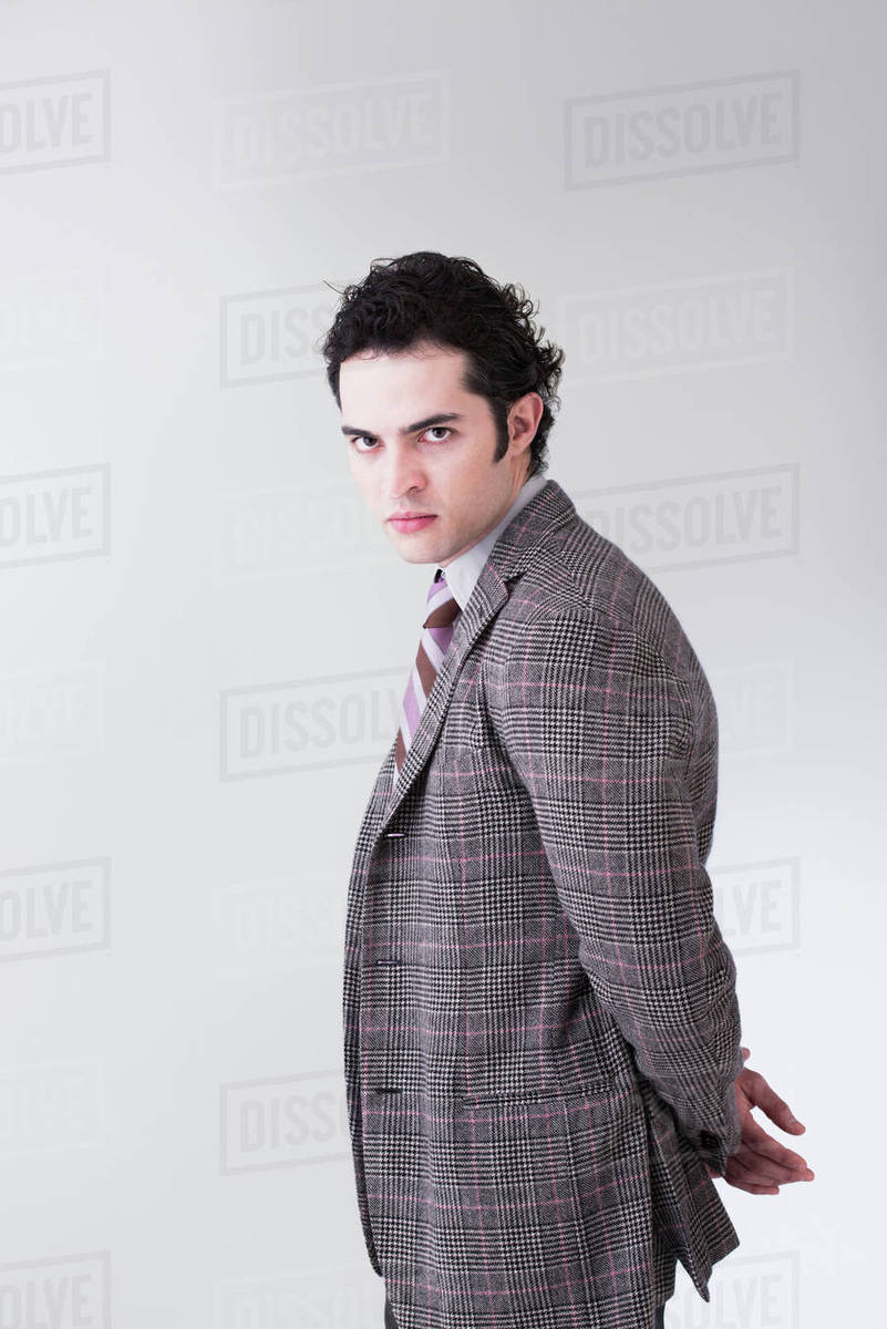 Man staring at camera - Stock Photo - Dissolve