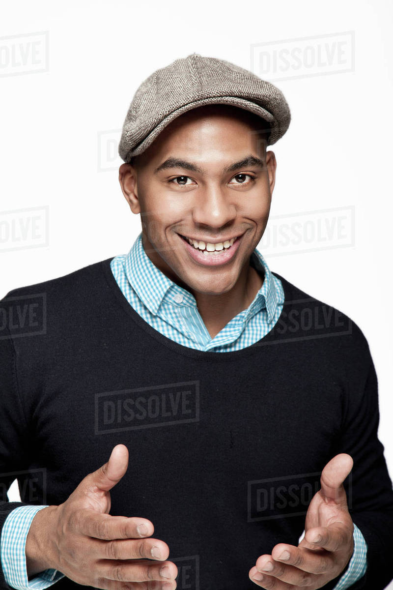 Portrait of man wearing cap, gesturing - Royalty-free Stock Photo ...
