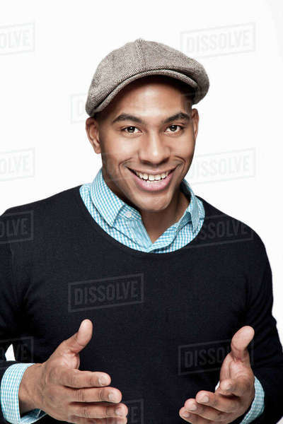 Portrait of man wearing cap, gesturing - Royalty-free Stock Photo ...