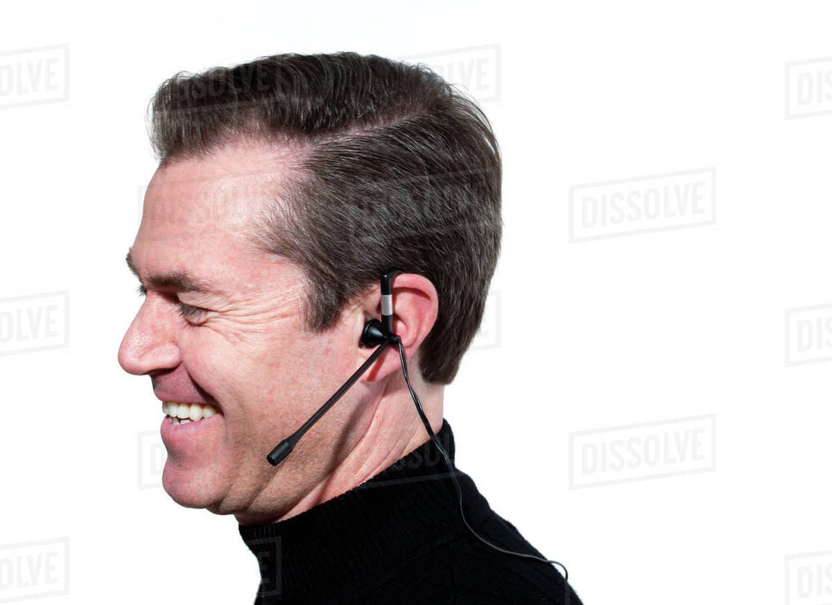 Man wearing headset - Royalty-free Stock Photo | Dissolve