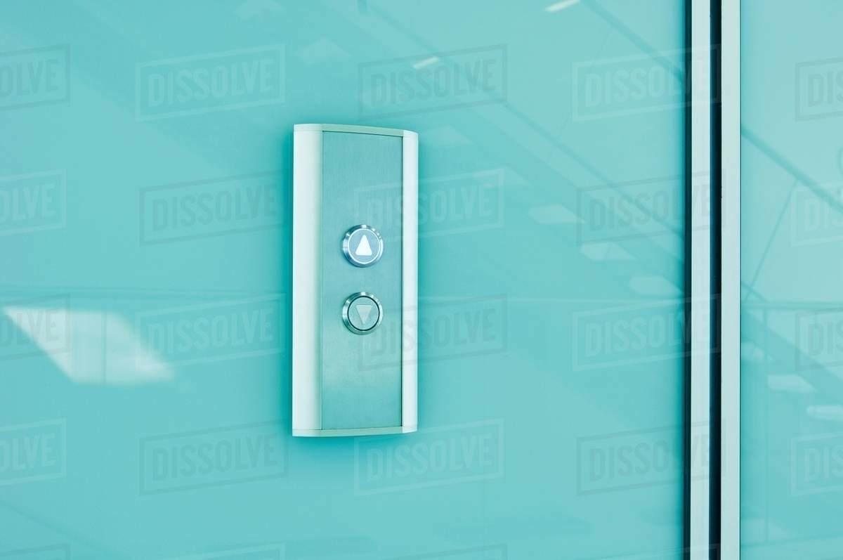 Elevator controls in modern office block - Stock Photo - Dissolve