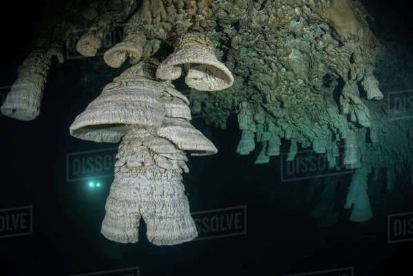 Rock formations in underwater caves - Royalty-free Stock Photo | Dissolve