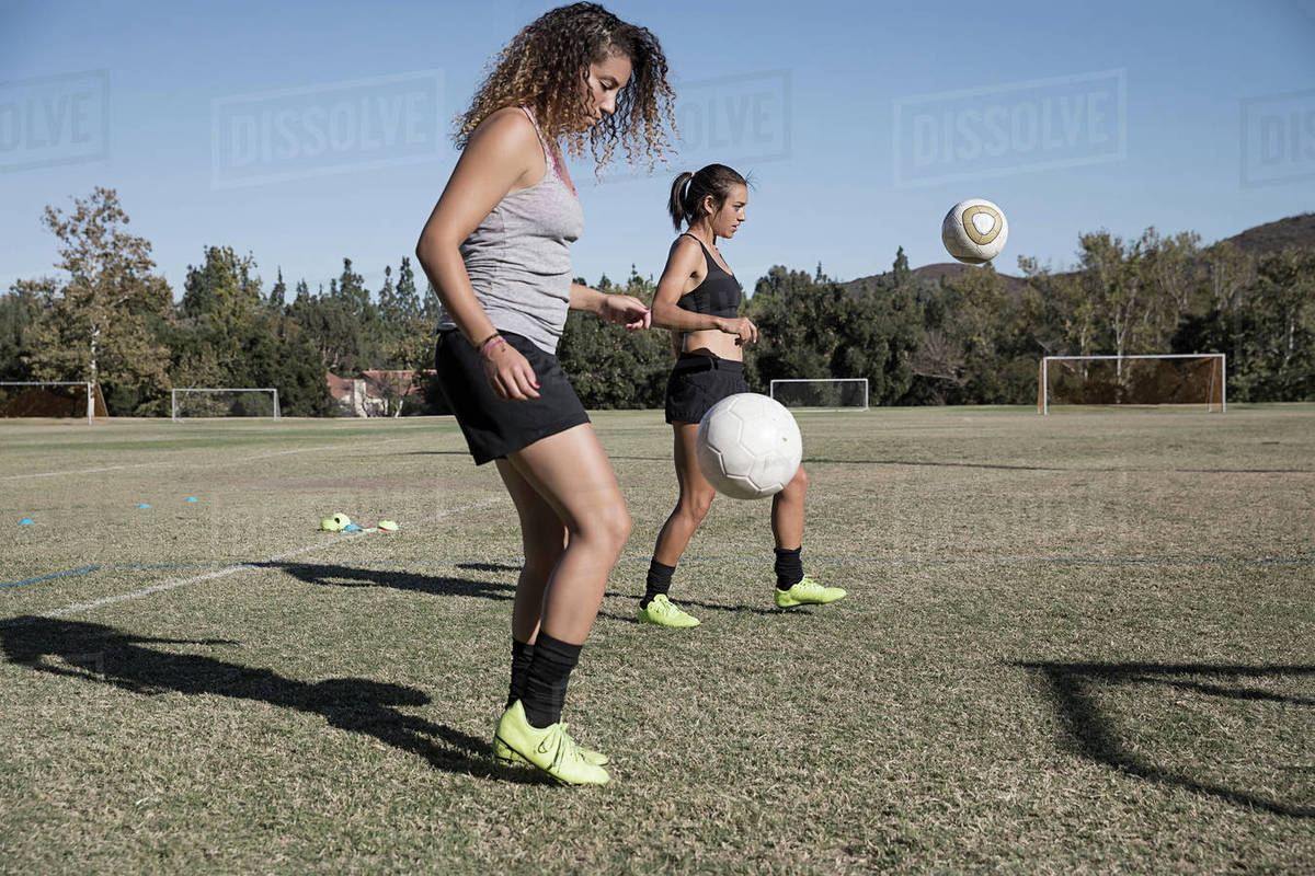Women of football pitch playing football - Royalty-free Stock Photo ...