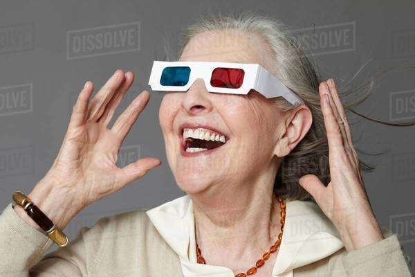 Senior woman wearing 3d glasses - Royalty-free Stock Photo | Dissolve