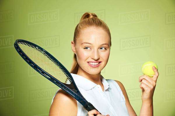 Young woman with tennis racket and tennis ball - Royalty-free Stock ...