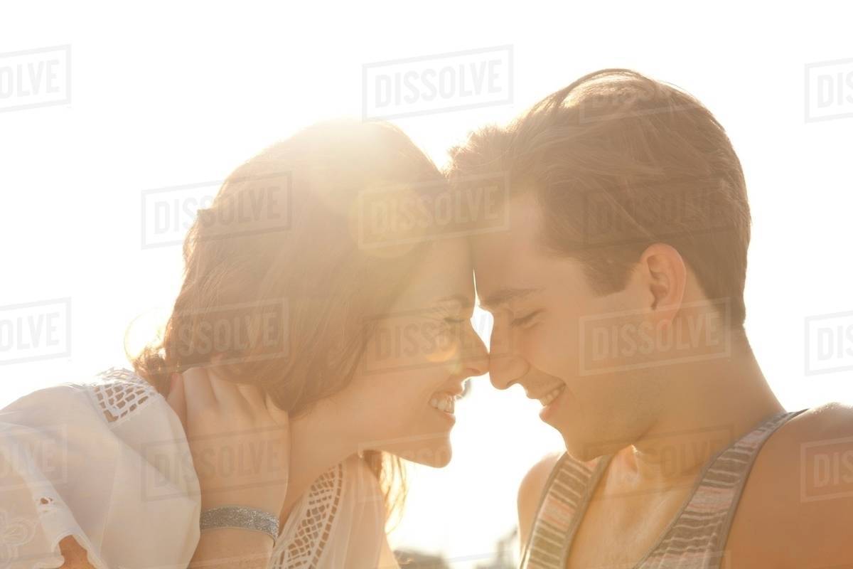 Affectionate young couple, portrait - Royalty-free Stock Photo | Dissolve
