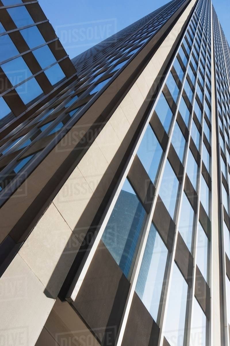 Low angle view of office building - Stock Photo - Dissolve