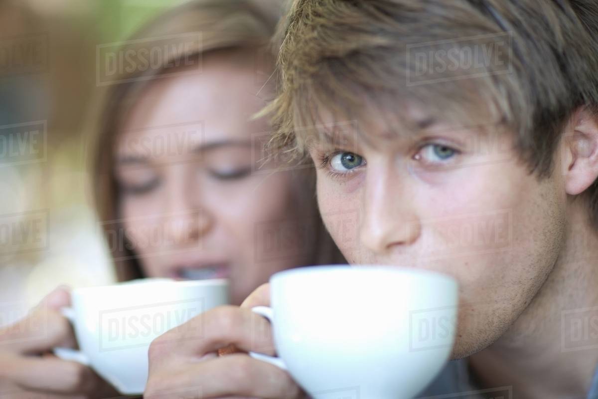 Couple drinking coffee together outdoors - Royalty-free Stock Photo ...