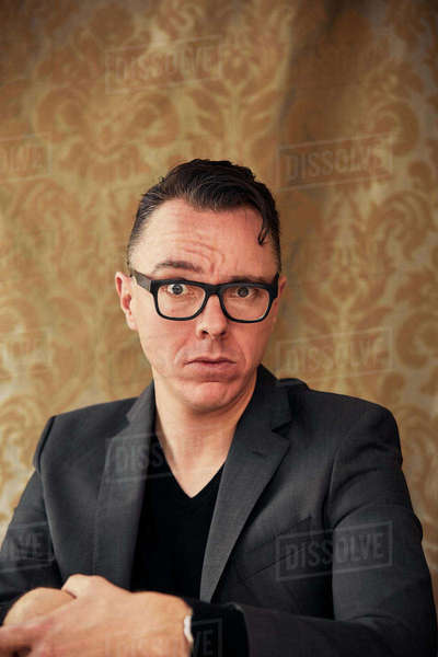 Comedian looking doubtful - Stock Photo - Dissolve