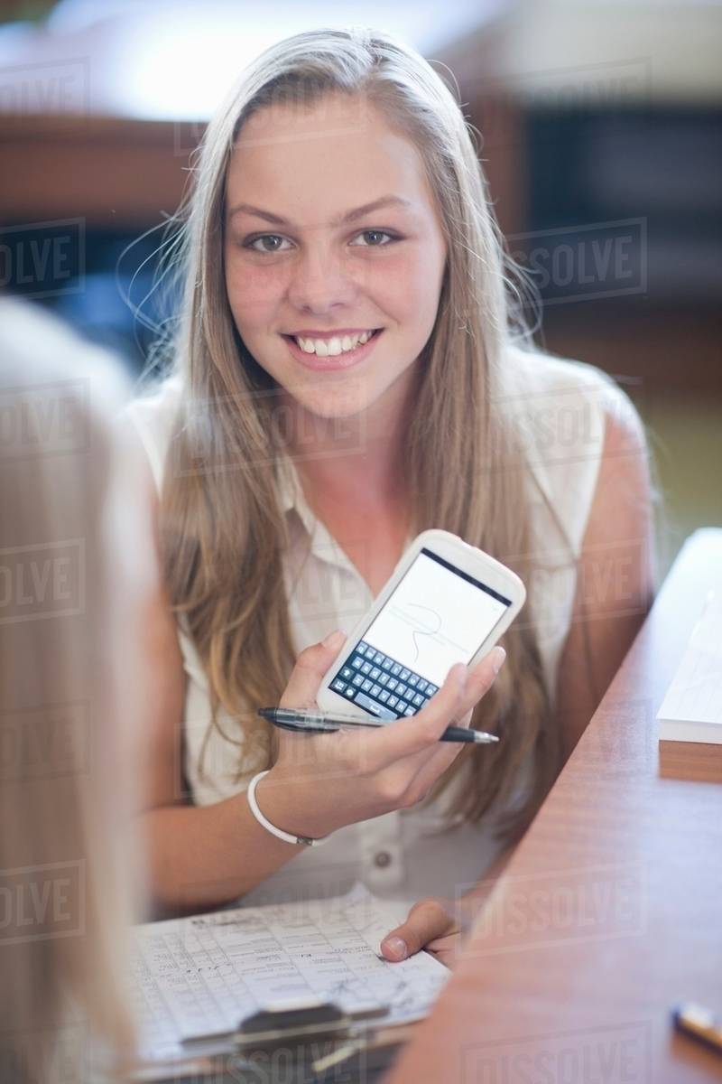 Student showing calculations - Stock Photo - Dissolve