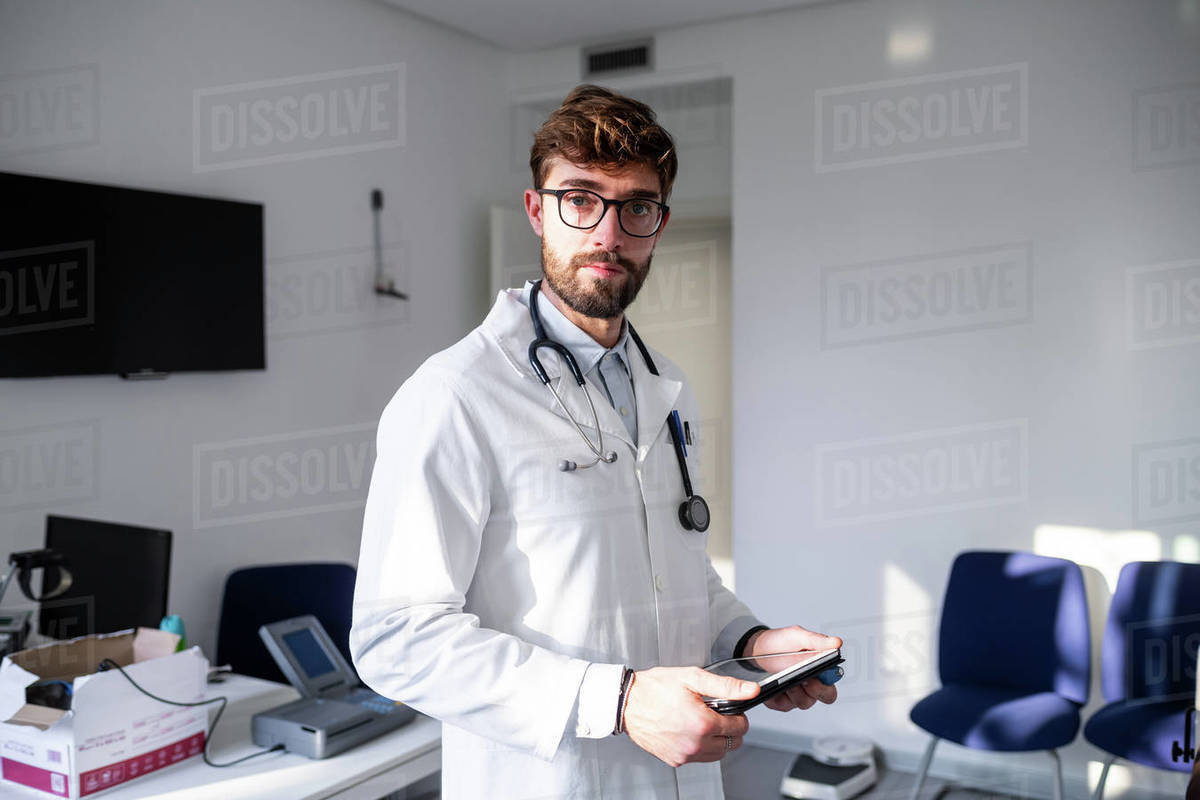 Doctor in consultation room - Royalty-free Stock Photo | Dissolve