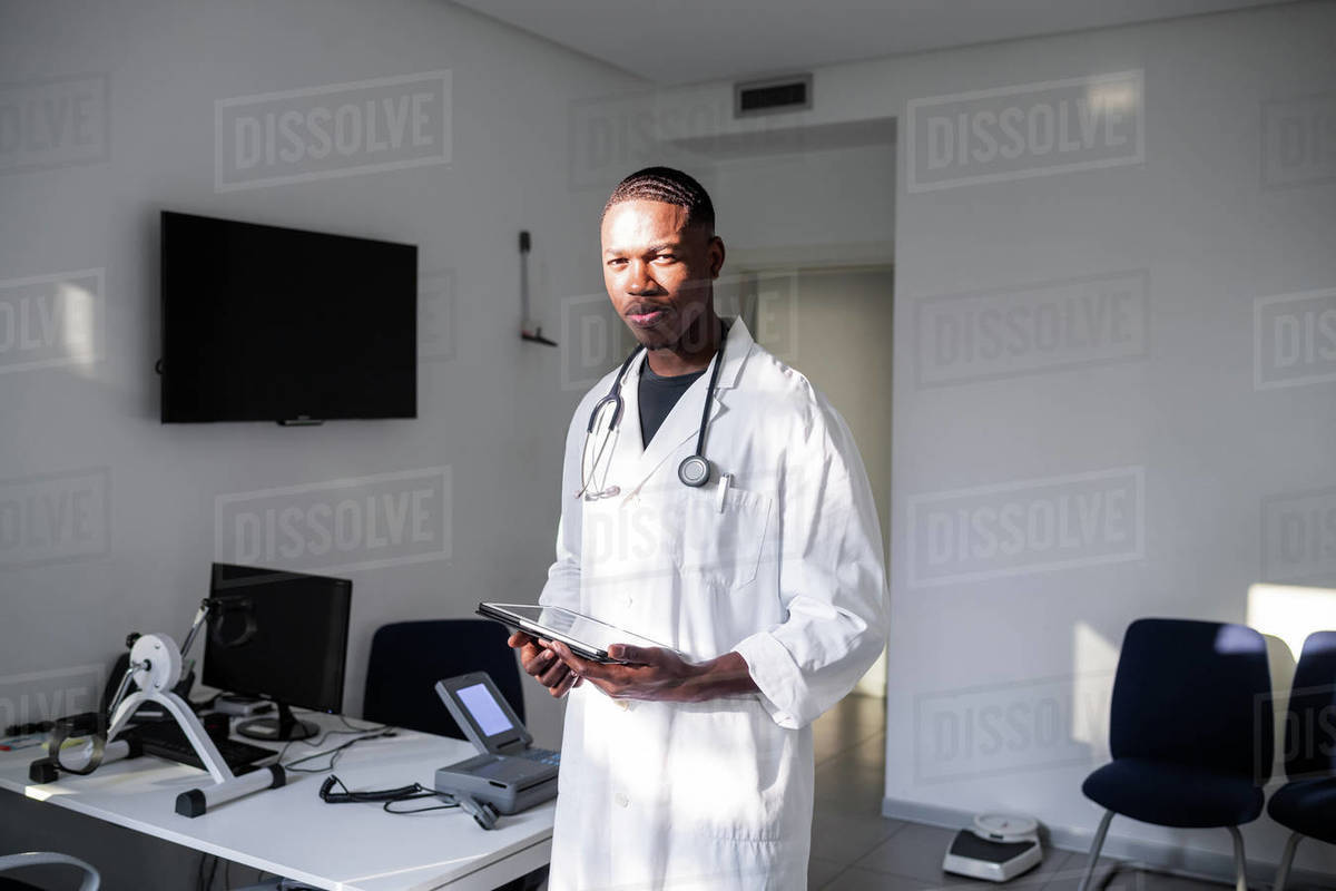 Doctor in consultation room - Royalty-free Stock Photo | Dissolve