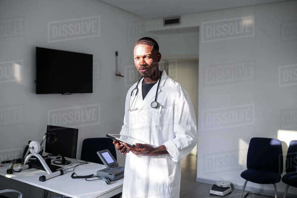 Doctor in consultation room - Royalty-free Stock Photo | Dissolve