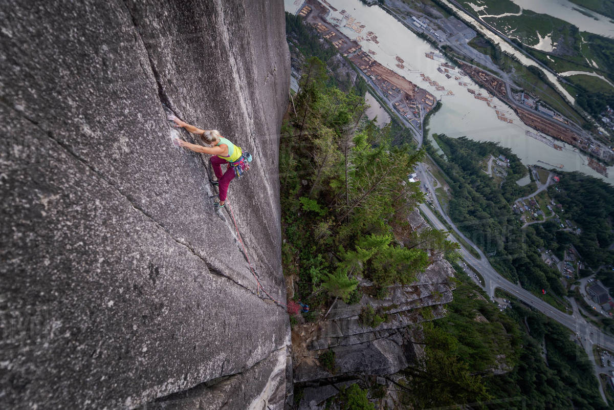 Rock climber on rock face of Heatwave, The Chief, Squamish, Canada ...