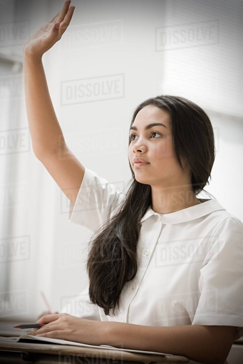Girl with hands raised - Royalty-free Stock Photo | Dissolve