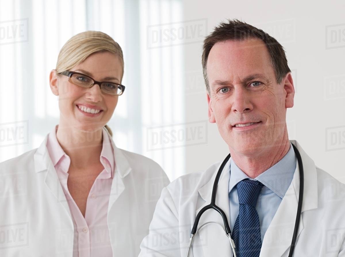 Two smiling doctors - Royalty-free Stock Photo | Dissolve