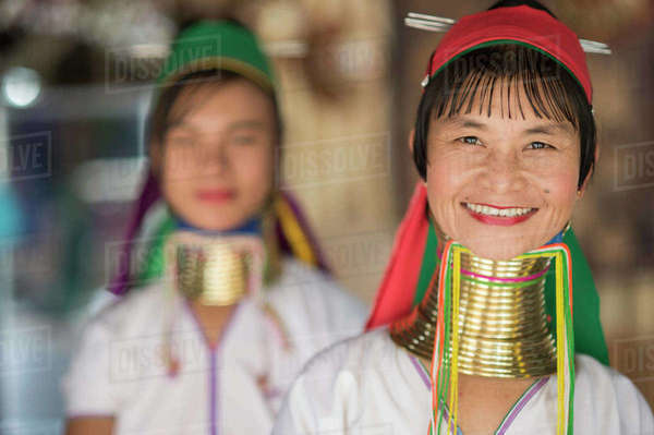 Portrait of two women in traditional clothing, Inle lake, Burma ...