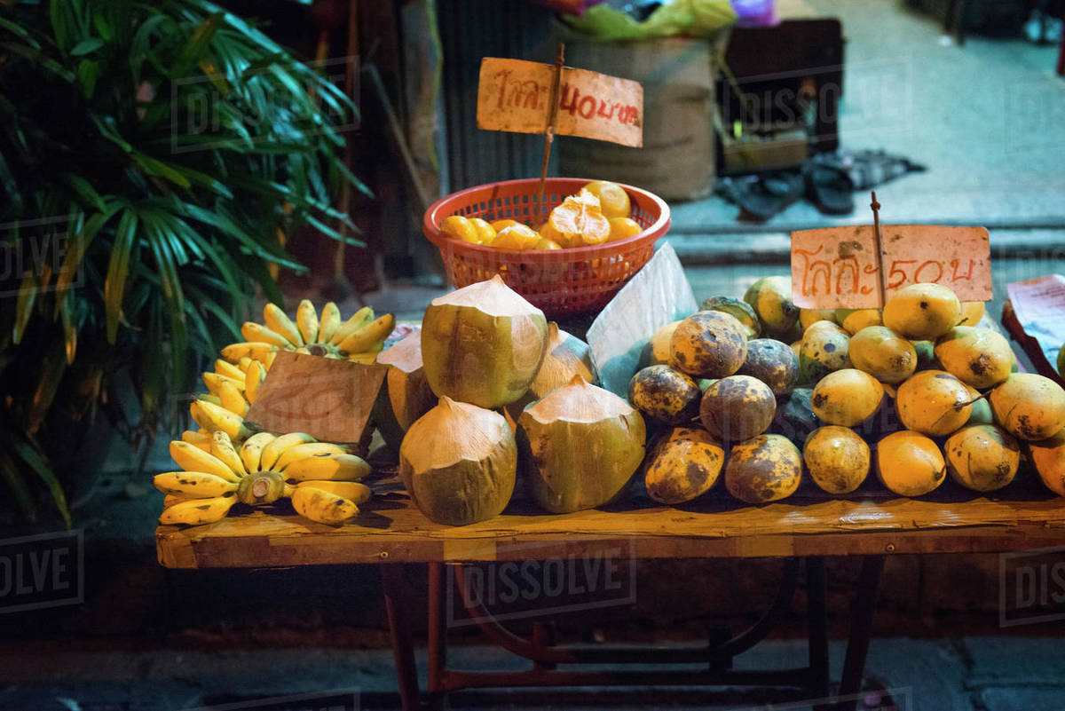 Coconuts for sale on market stall, Bangkok, Thailand - Stock Photo ...
