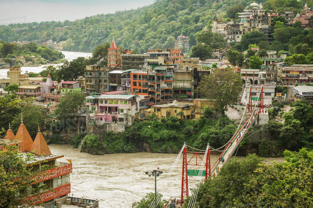 Suspension bridge across river, Rishikesh, Uttarakhand, India - Royalty ...