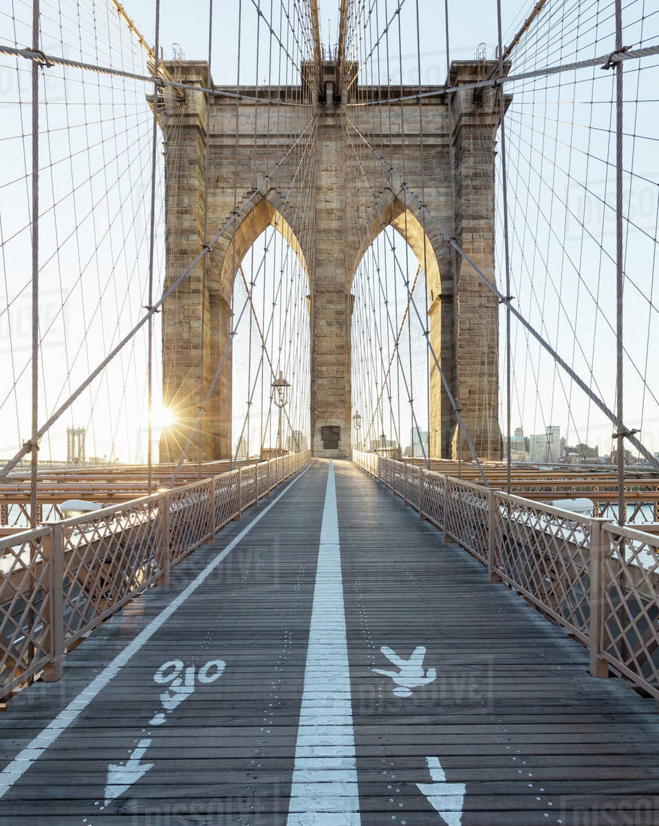 USA, NY, New York City, Brooklyn Bridge footpath and bike lane at ...