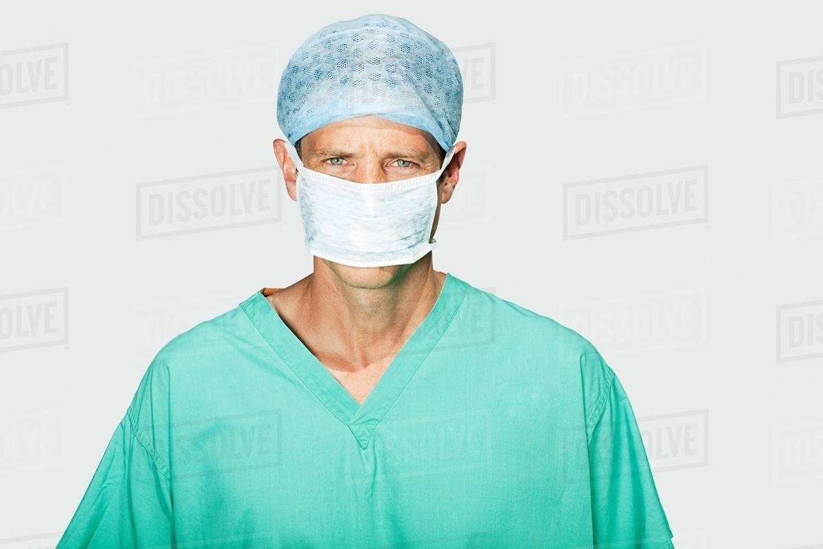 Portrait of a surgeon in mask - Stock Photo - Dissolve