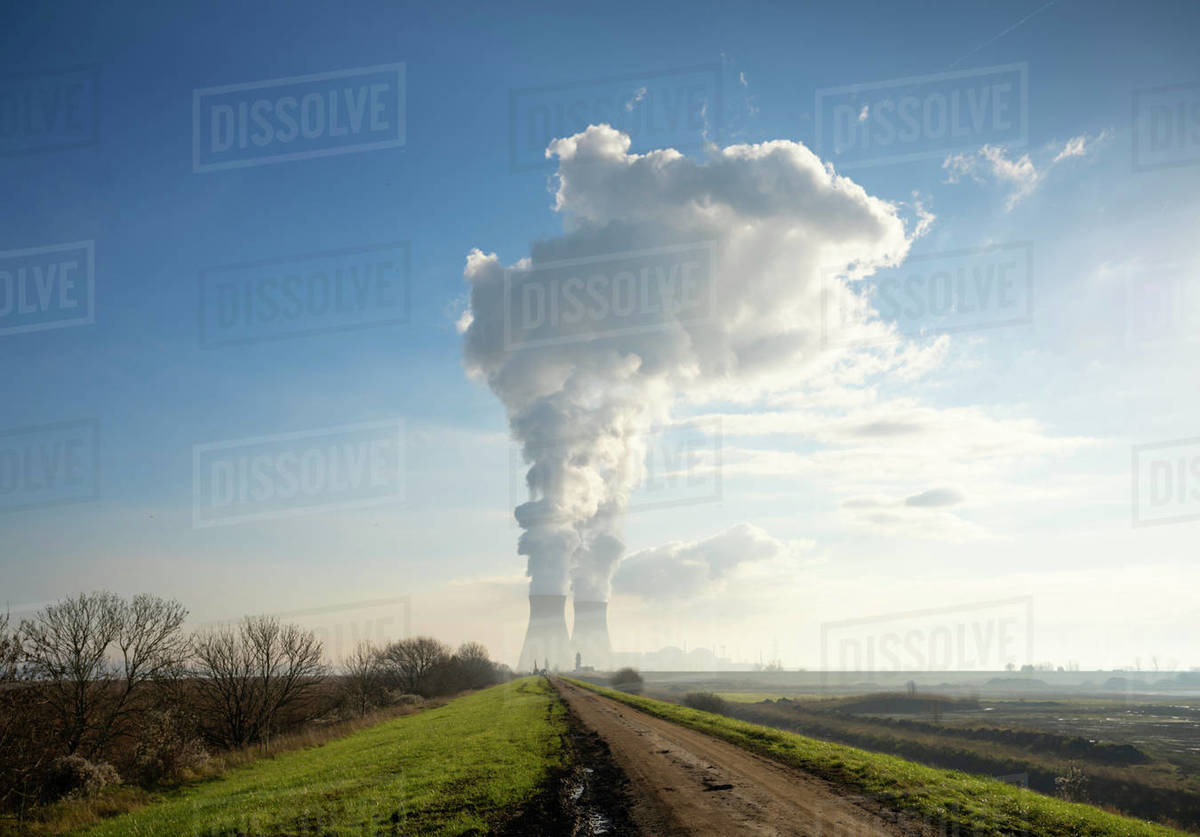 Steam rising from cooling towers of nuclear power plant - Stock Photo ...