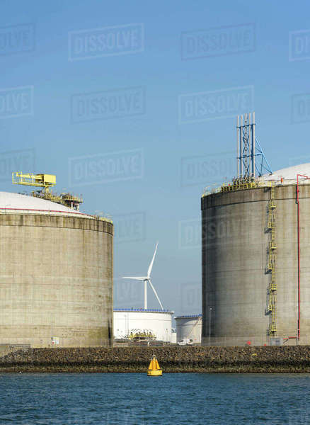 Storage tanks and wind turbine at GATE LNG terminal / Rotterdam ...