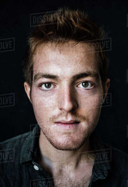 Studio portrait of young man - Royalty-free Stock Photo | Dissolve
