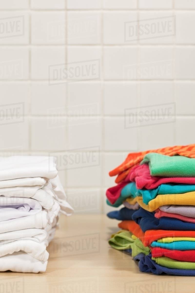 Piles of clean laundry - Royalty-free Stock Photo | Dissolve