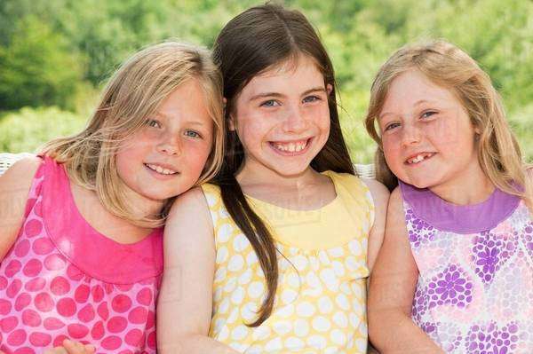 Three girls, portrait - Stock Photo - Dissolve