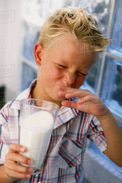 Boy drinking milk - Royalty-free Stock Photo | Dissolve
