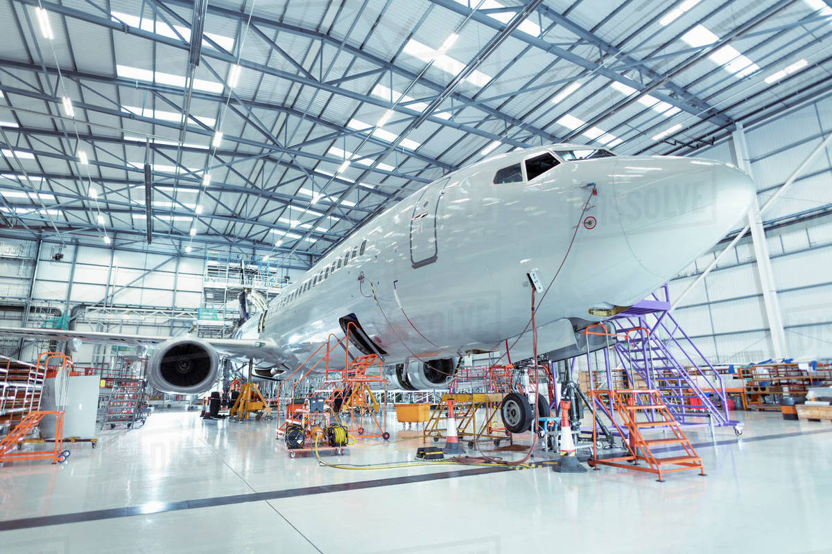 Large aircraft in aircraft maintenance hangar - Royalty-free Stock ...